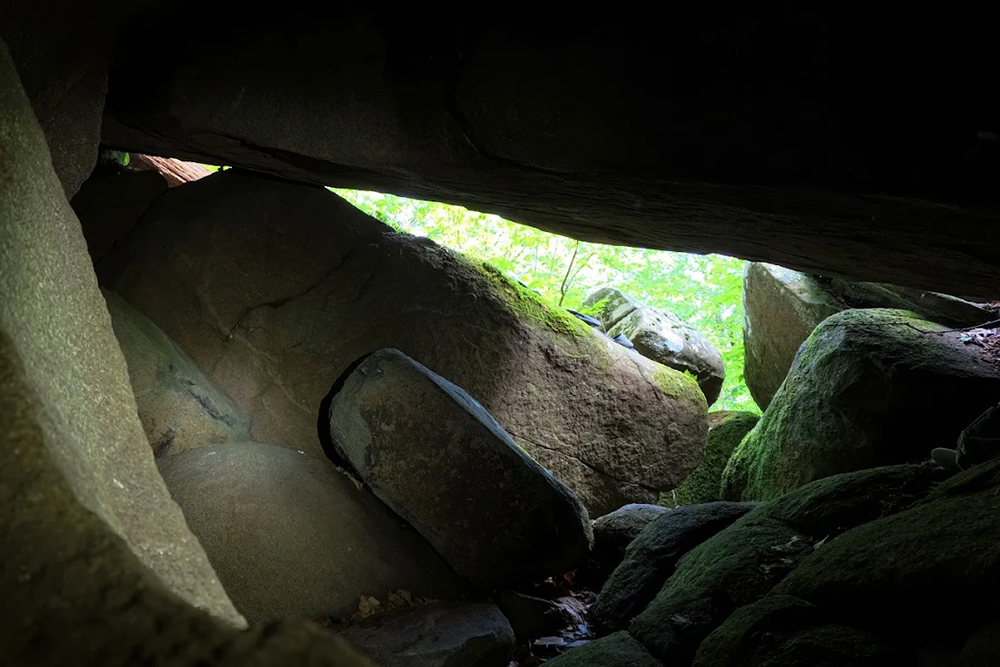 Explore the Mysterious Devil's Hole Boulder Caves